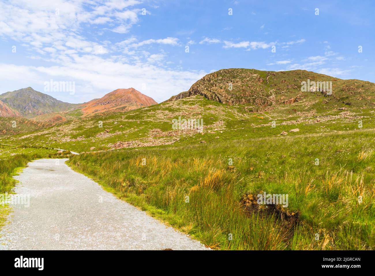 A scenic view of Snowdon mountain in Wales in cloudy sky background ...