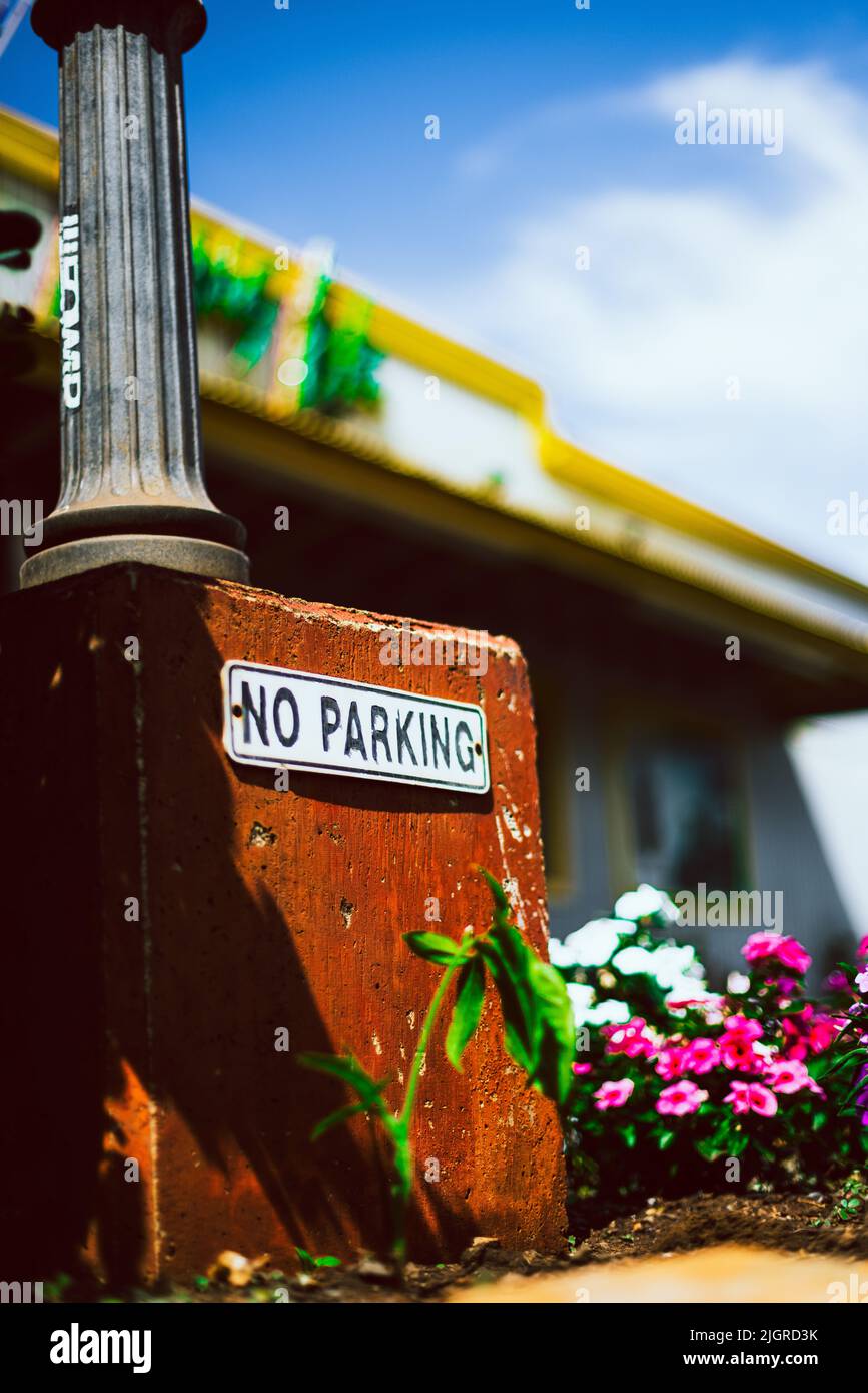 A street sign with "no parking" text Stock Photo - Alamy