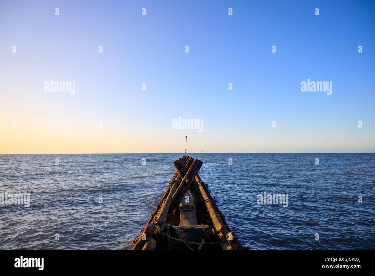 The Aberaeron Breakwater with a channel navigation marker at high tide ...