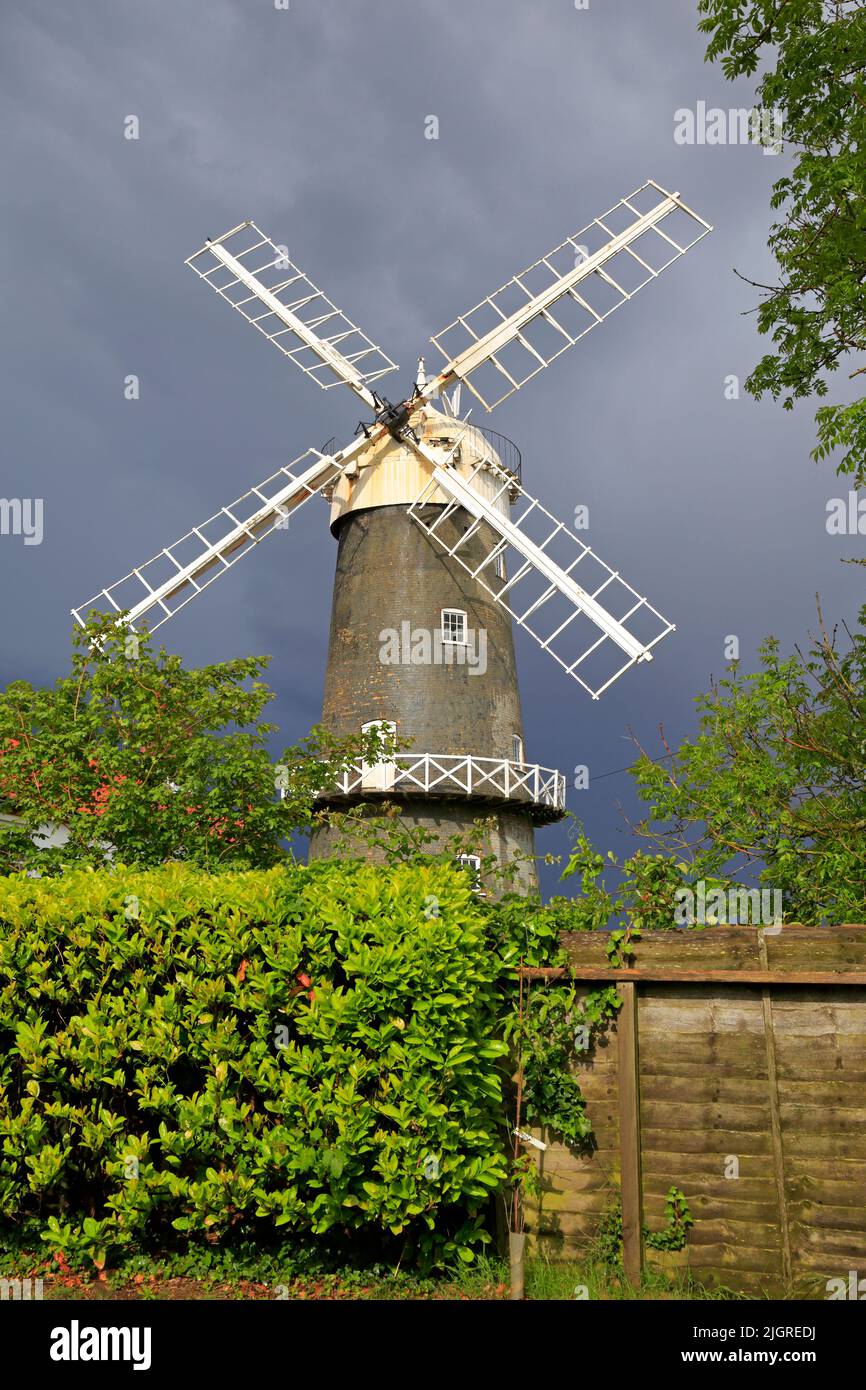 Stormy sky behind Bircham windmill, Great Bircham, Norfolk, England, UK ...