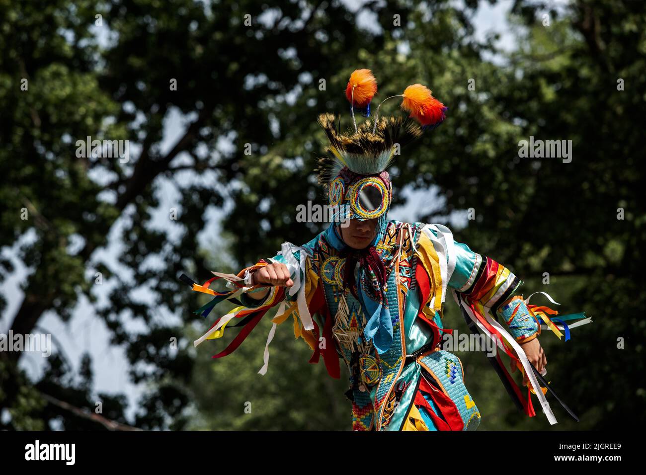 Kahnawake, Canada. 10th July, 2022. A pow-wow participant doing a ...