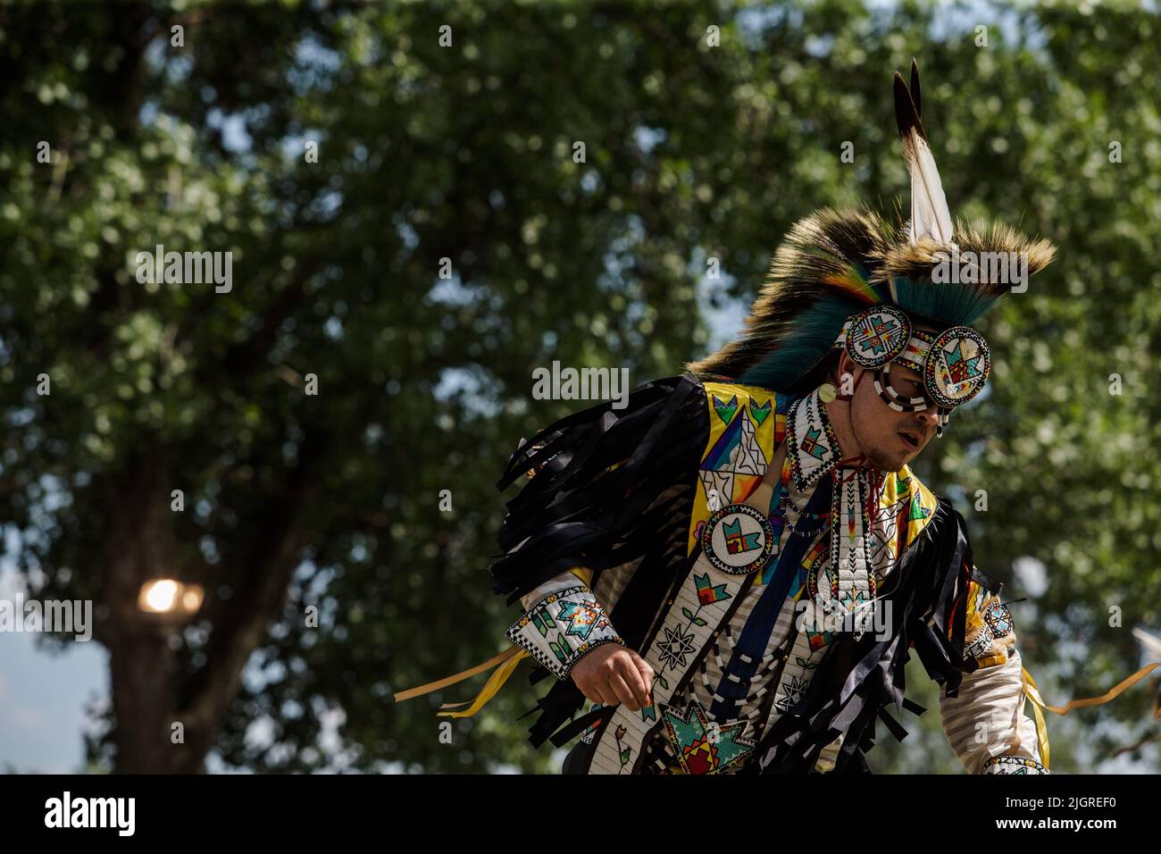 Kahnawake, Canada. 10th July, 2022. A pow-wow participant doing a ...
