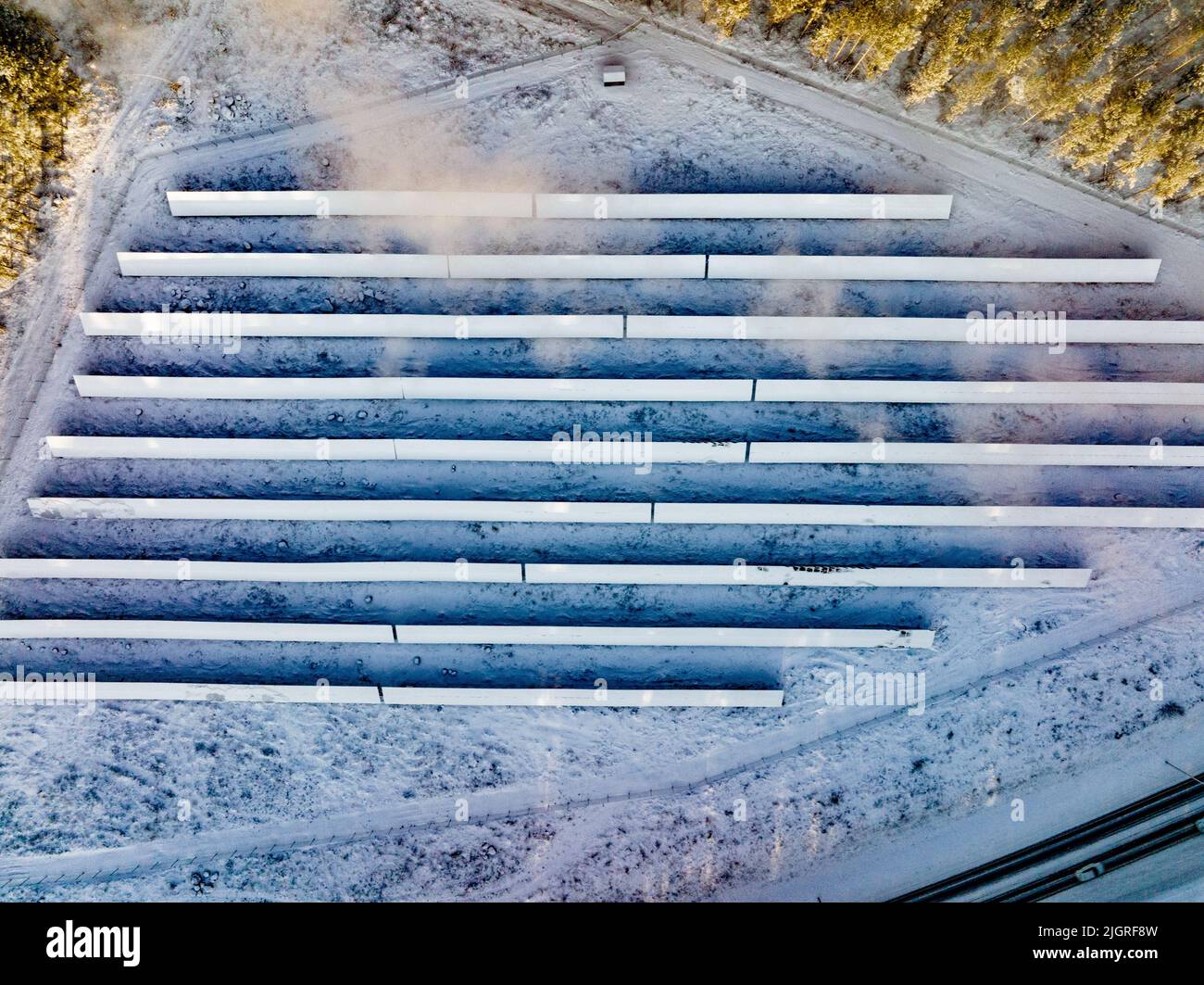 Aerial view of a pollution cloud moving over frozen solar cells ...
