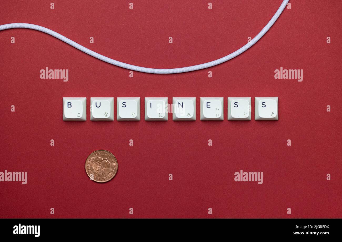 Keys spelling out the word business. Keycaps of a Keyboard forming to ...