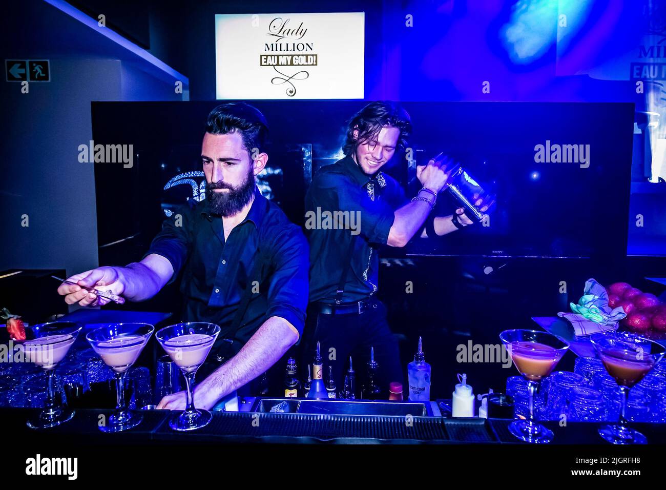 Two cocktail bartenders making drinks at a party event in Johannesburg ...