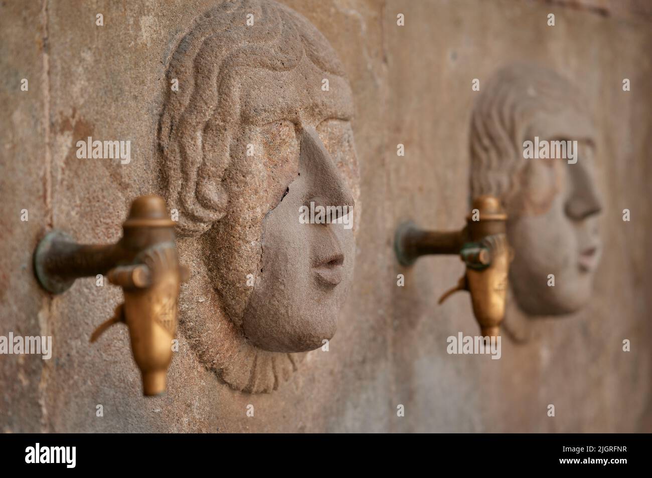 Details of a medieval water fountain sculture at gothic quarter in ...
