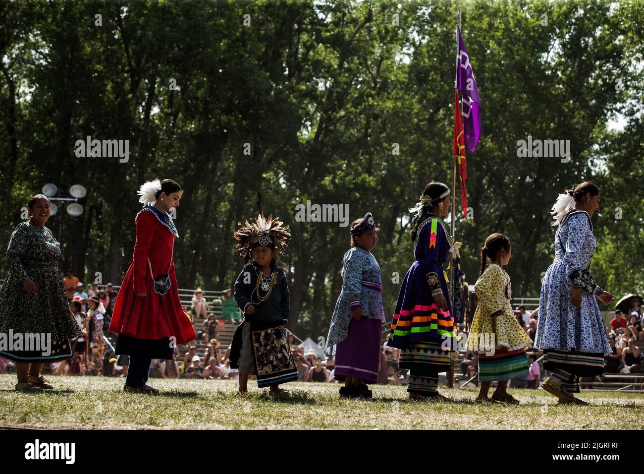 Kahnawake, Canada. 10th July, 2022. Pow-wow participants waiting for ...