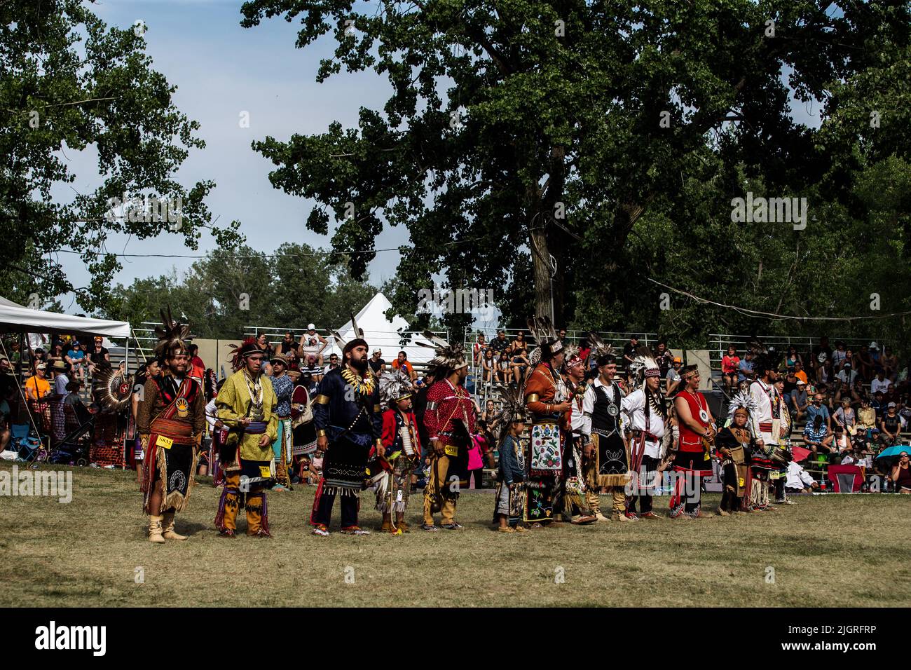 Kahnawake, Canada. 10th July, 2022. Participants of the pow-wow waiting ...