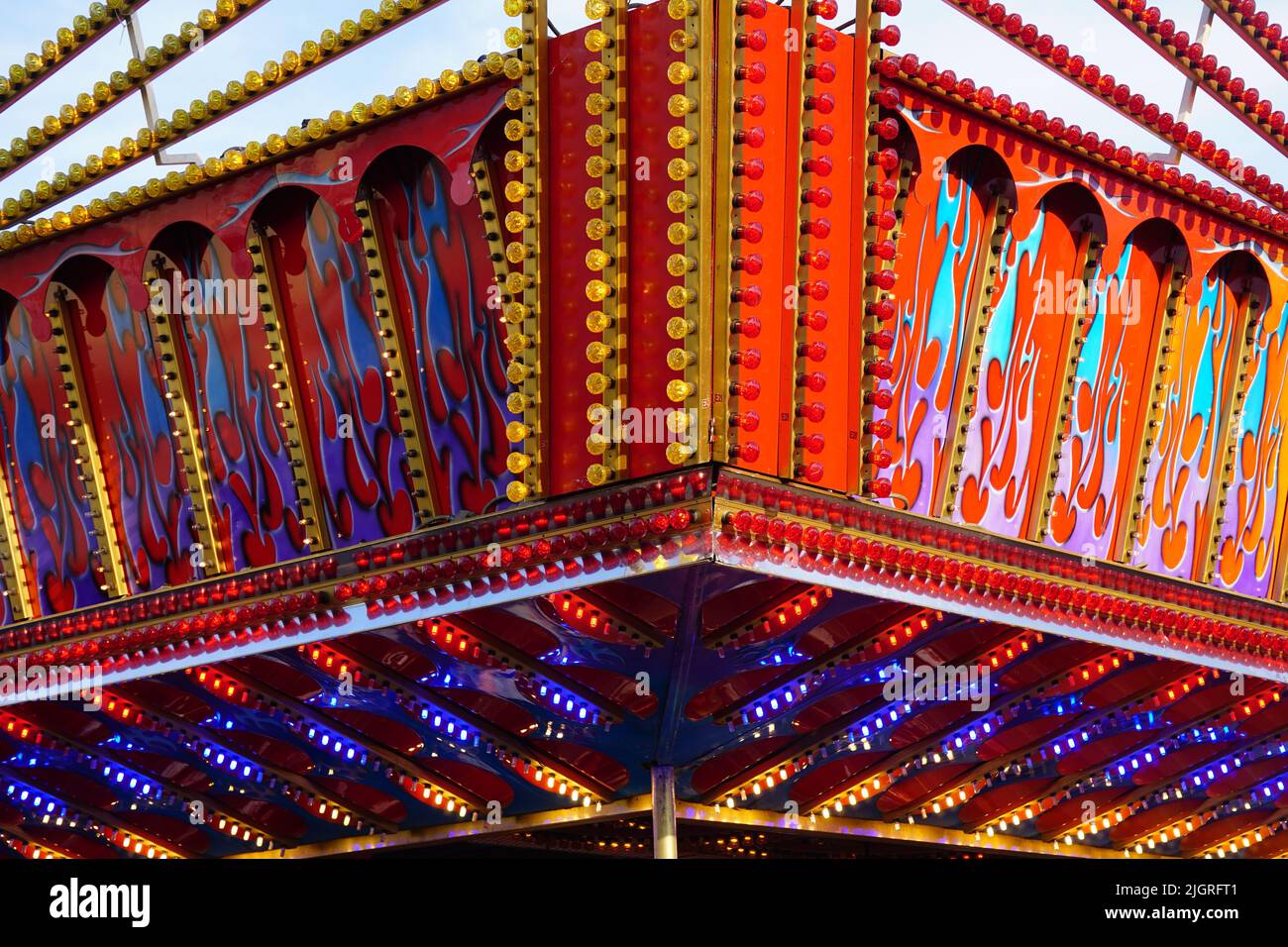 The colorful carousel in the amusement park Stock Photo - Alamy