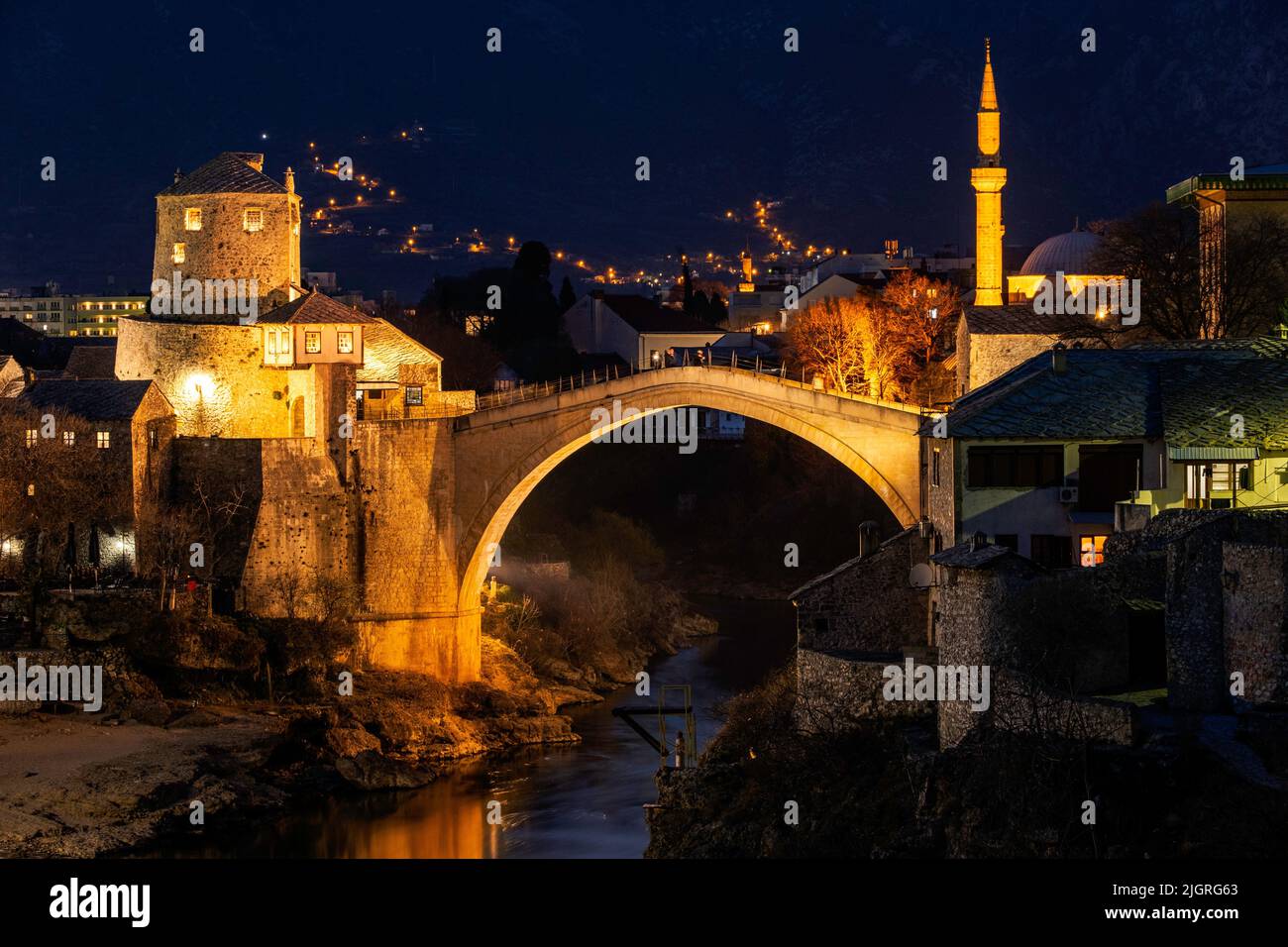 A beautiful shot of Mostar Old Bridge at night, Bosnia and Herzegovina ...