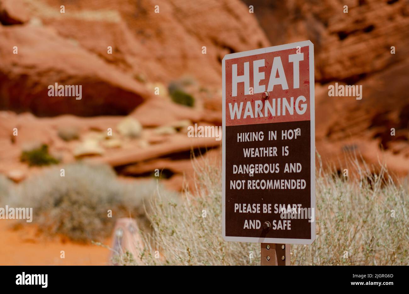 A heat warning sign for hikers Stock Photo - Alamy