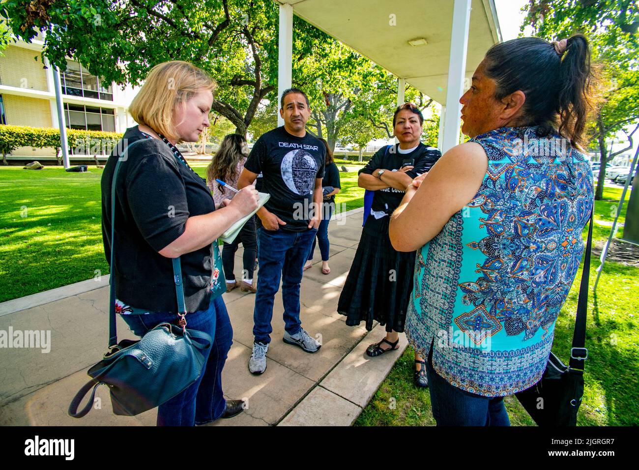 While conducting an interview in Costa Mesa, CA, a newspaper reporter ...
