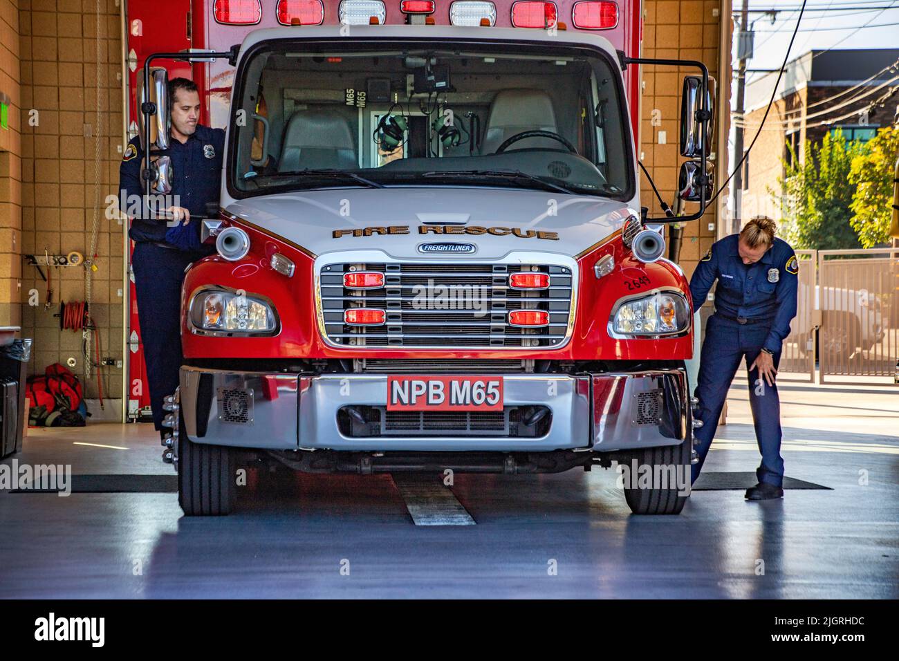 A fire engine gets a cleaning and polishing at a firehouse in Newport ...