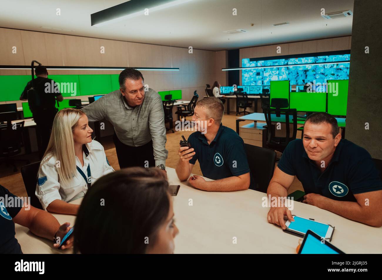 Man surrounded by screens hi-res stock photography and images - Alamy