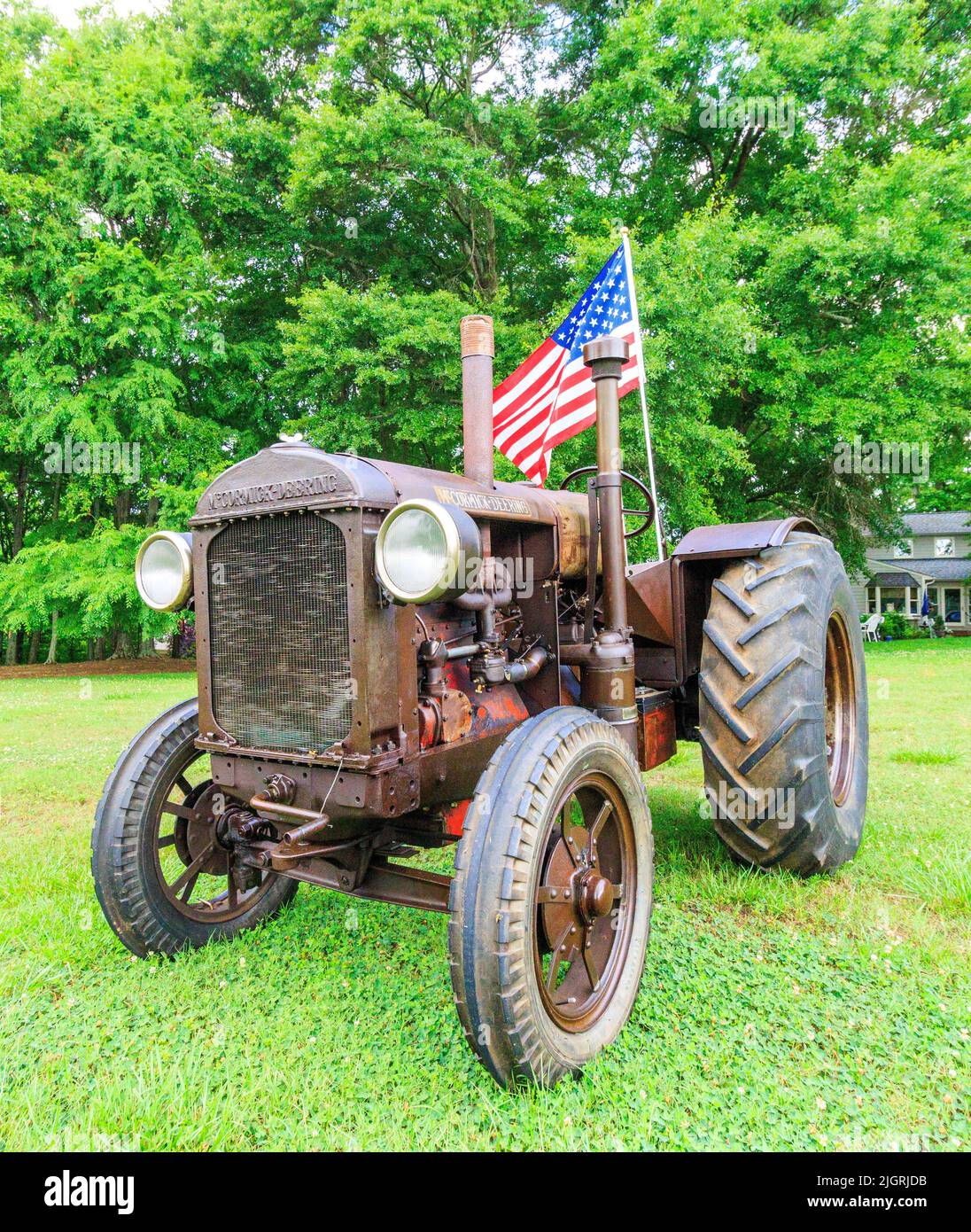 A front shot of an old Farmall Tractor in the field, United States ...