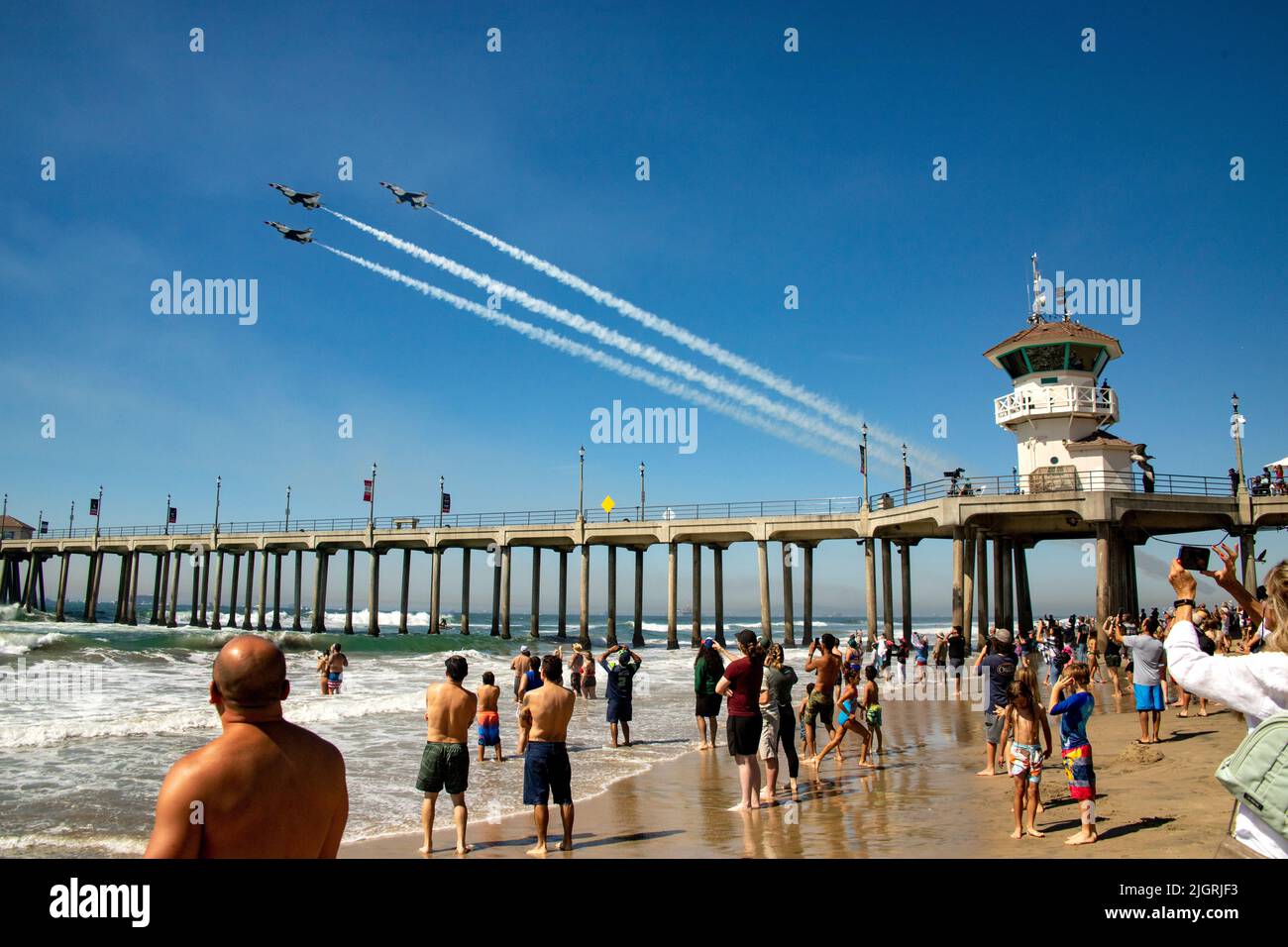 The U.S. Air Force Thunderbirds do a fly past over Huntington Beach ...