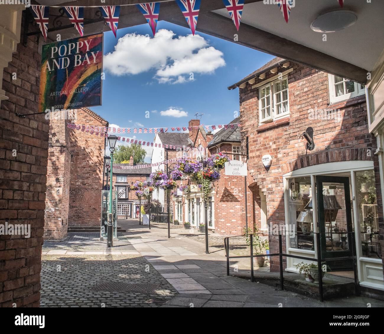 Nantwich Town Centre retail village on a sunny day - Queen's 70th ...