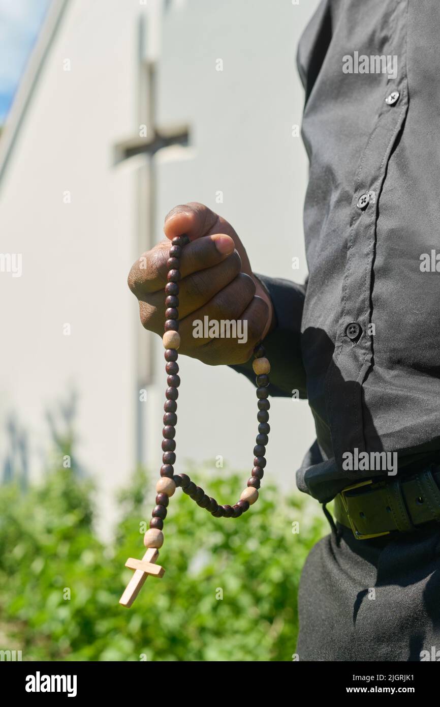The rosary priest hi-res stock photography and images - Alamy