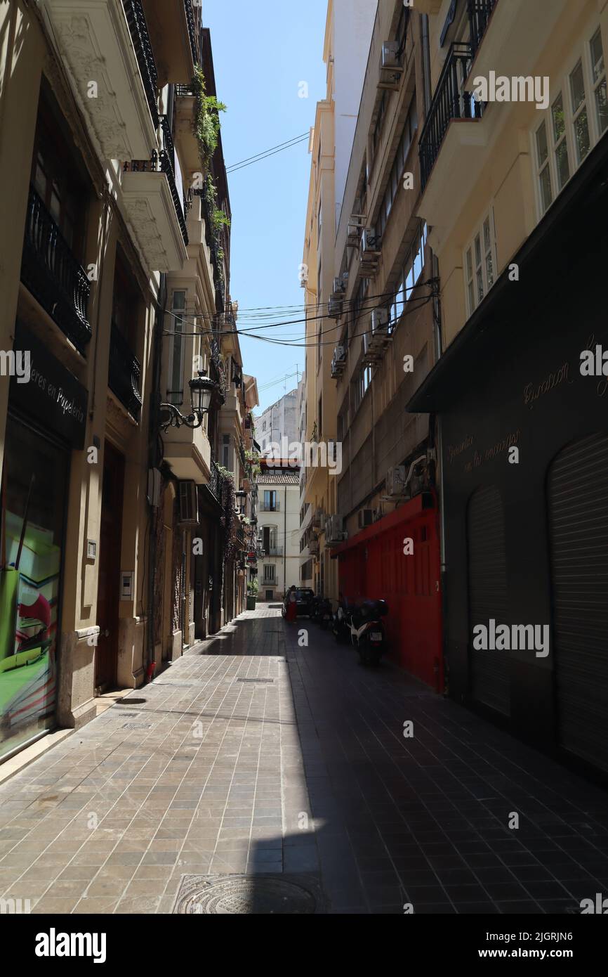 small street in a Spanish city with shops Stock Photo - Alamy