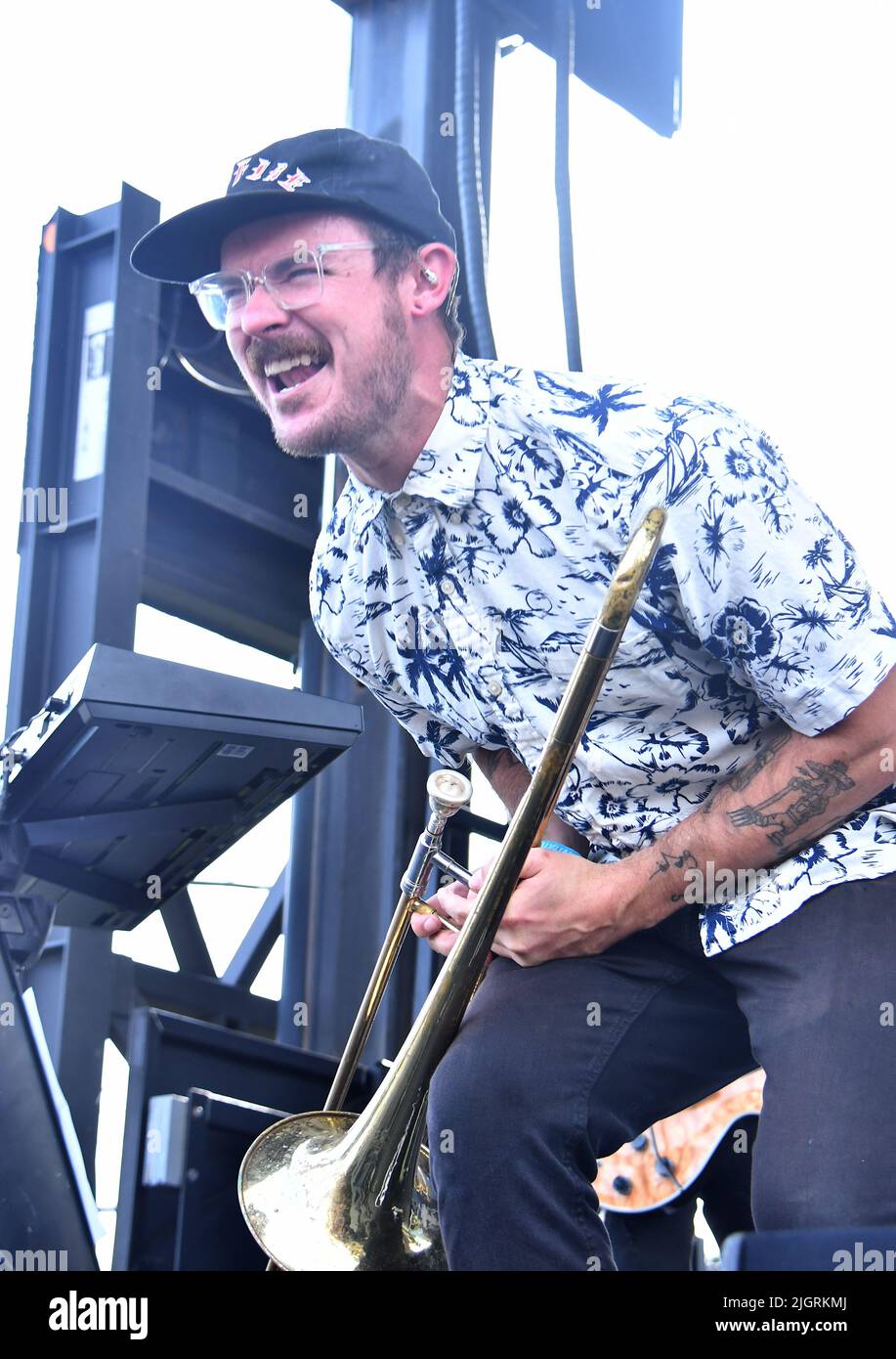 Singer and trombonist James Begin is shown performing on stage during a ...