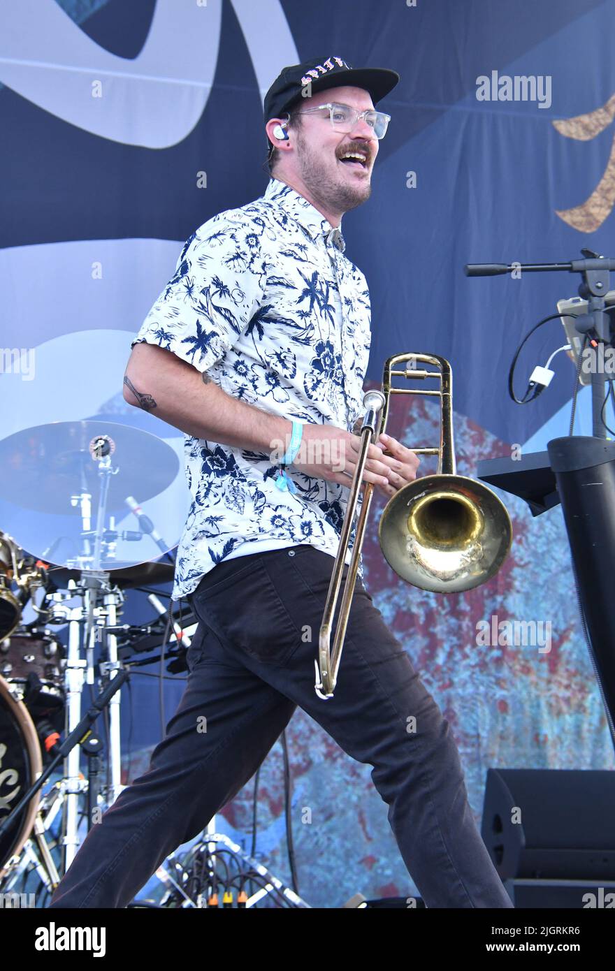 Singer and trombonist James Begin is shown performing on stage during a ...