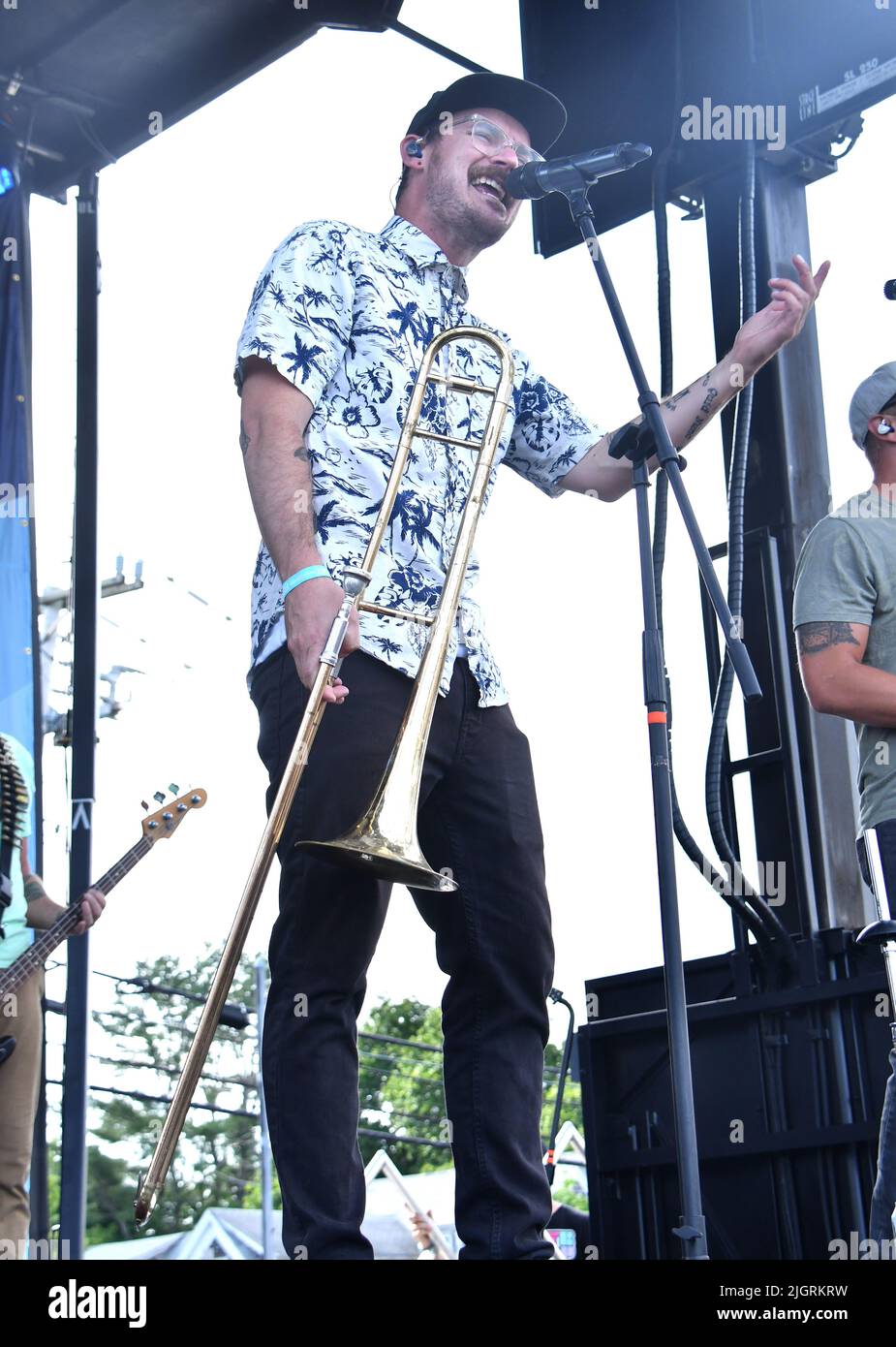 Singer and trombonist James Begin is shown performing on stage during a ...