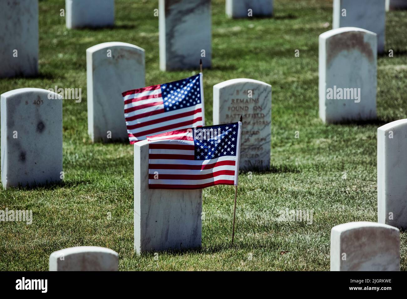 The American flags at the National Cemetery Stock Photo - Alamy