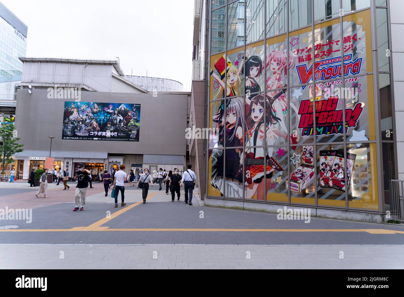 Akihabara, Japan- July 30, 2020: People walk past a giant anime ...