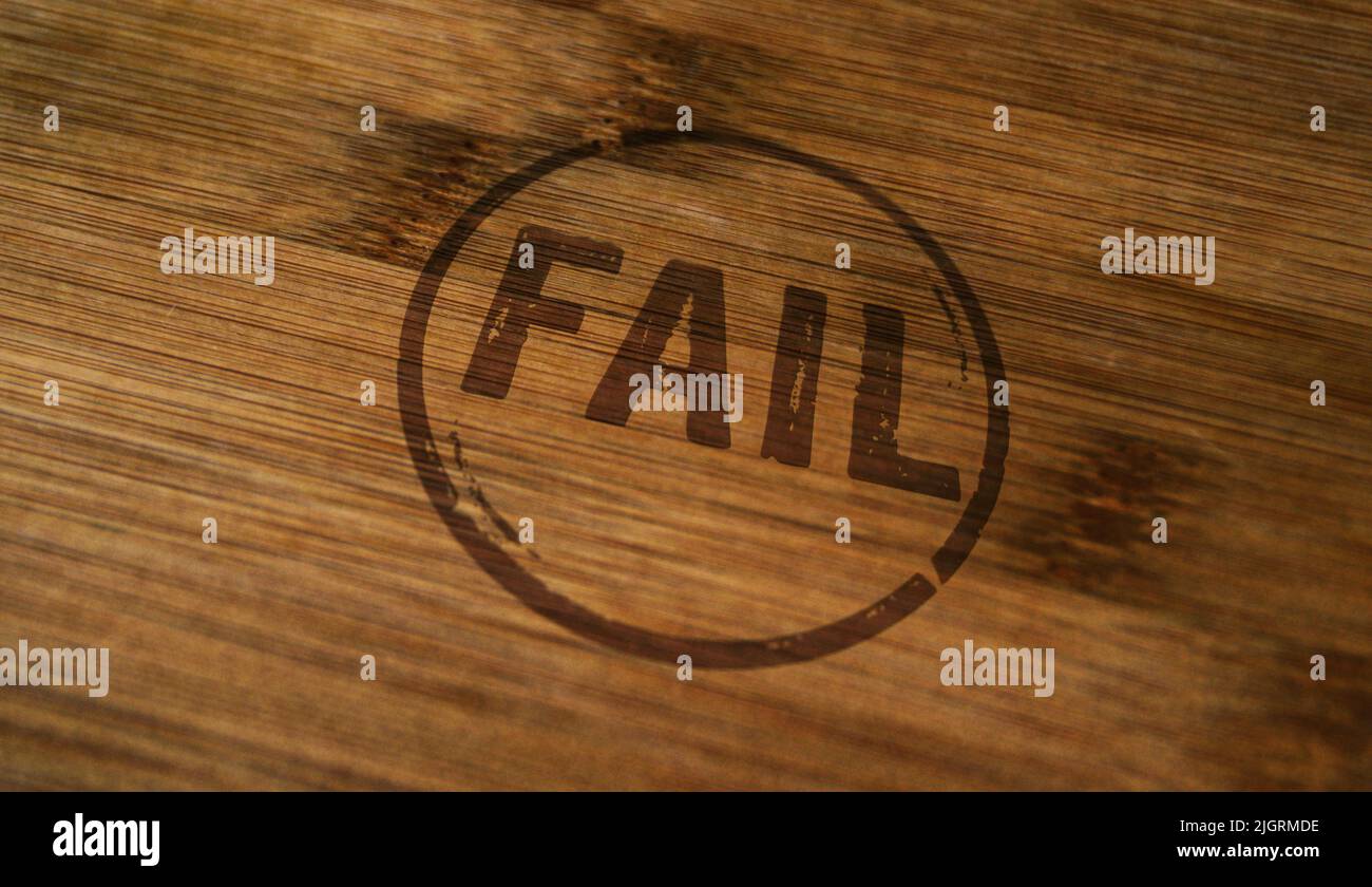 Fail stamp printed on wooden box. Failure, bankrupt and failed business ...