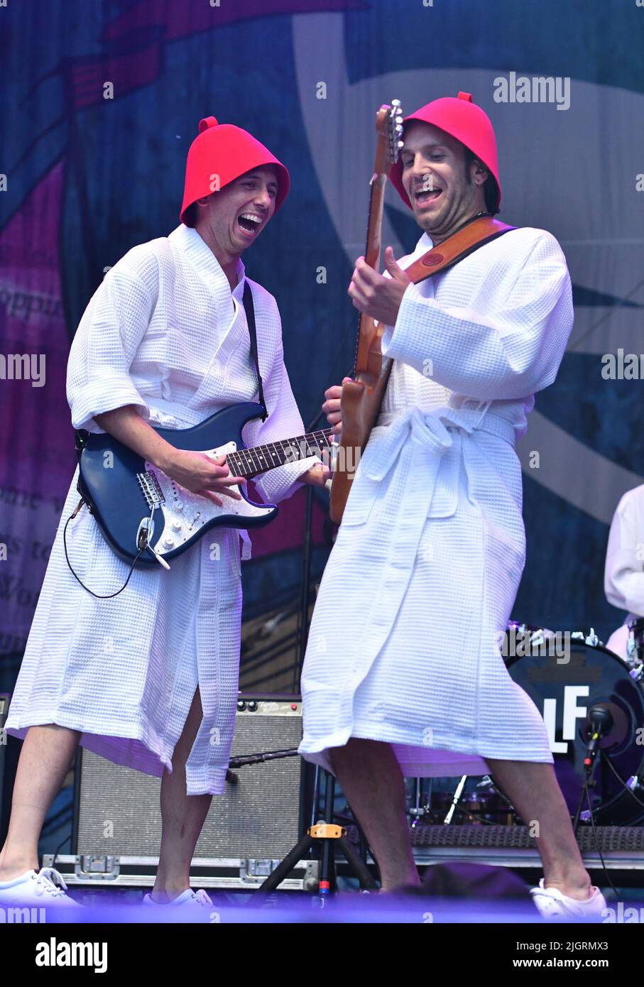 Vulfpeck band members are shown performing on stage during a “live ...