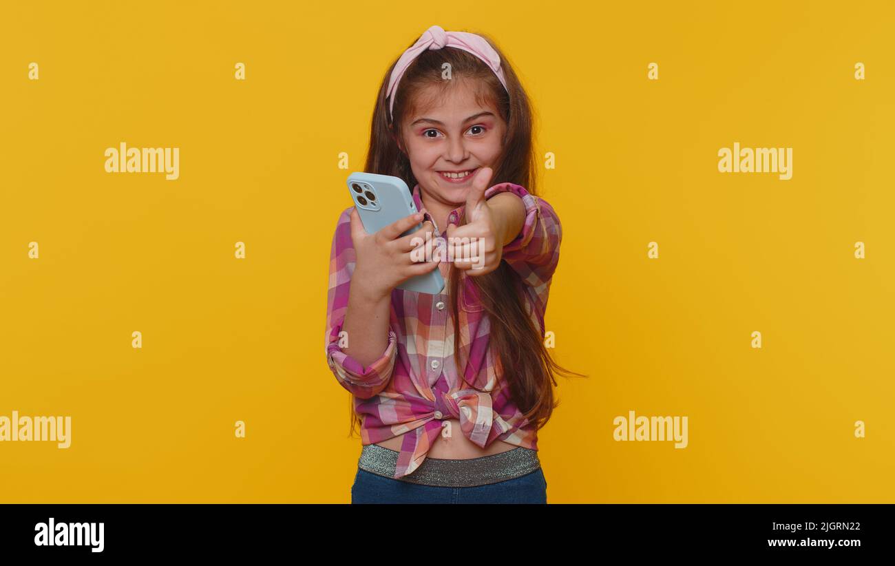 Young preteen child girl kid texting share messages content on ...