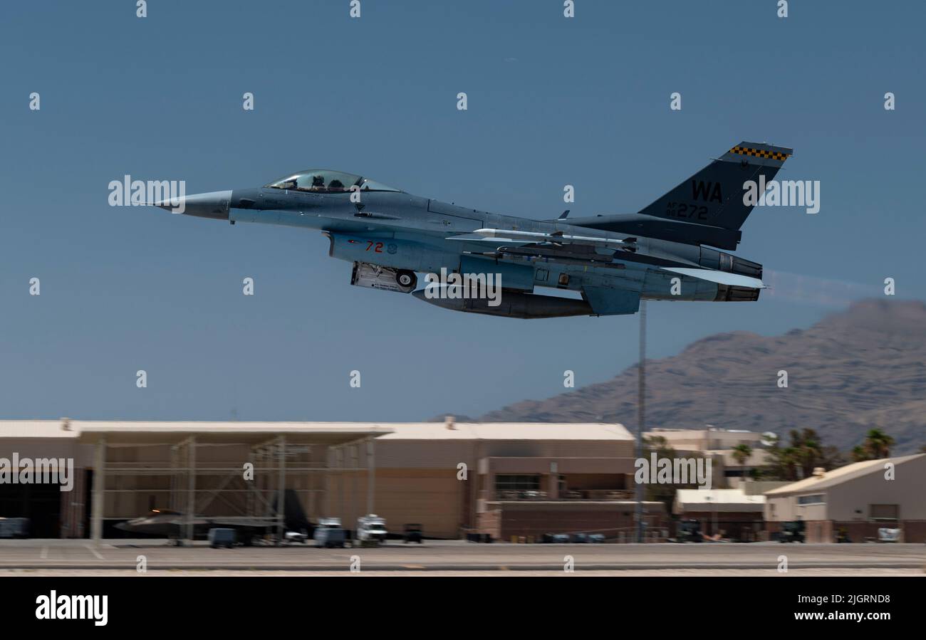 An F-16 Aggressor assigned to the 64th Aggressor Squadron, Nellis Air ...