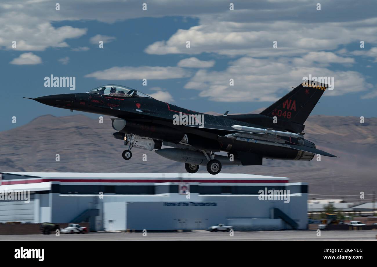 An F-16 Aggressor assigned to the 64th Aggressor Squadron, Nellis Air ...