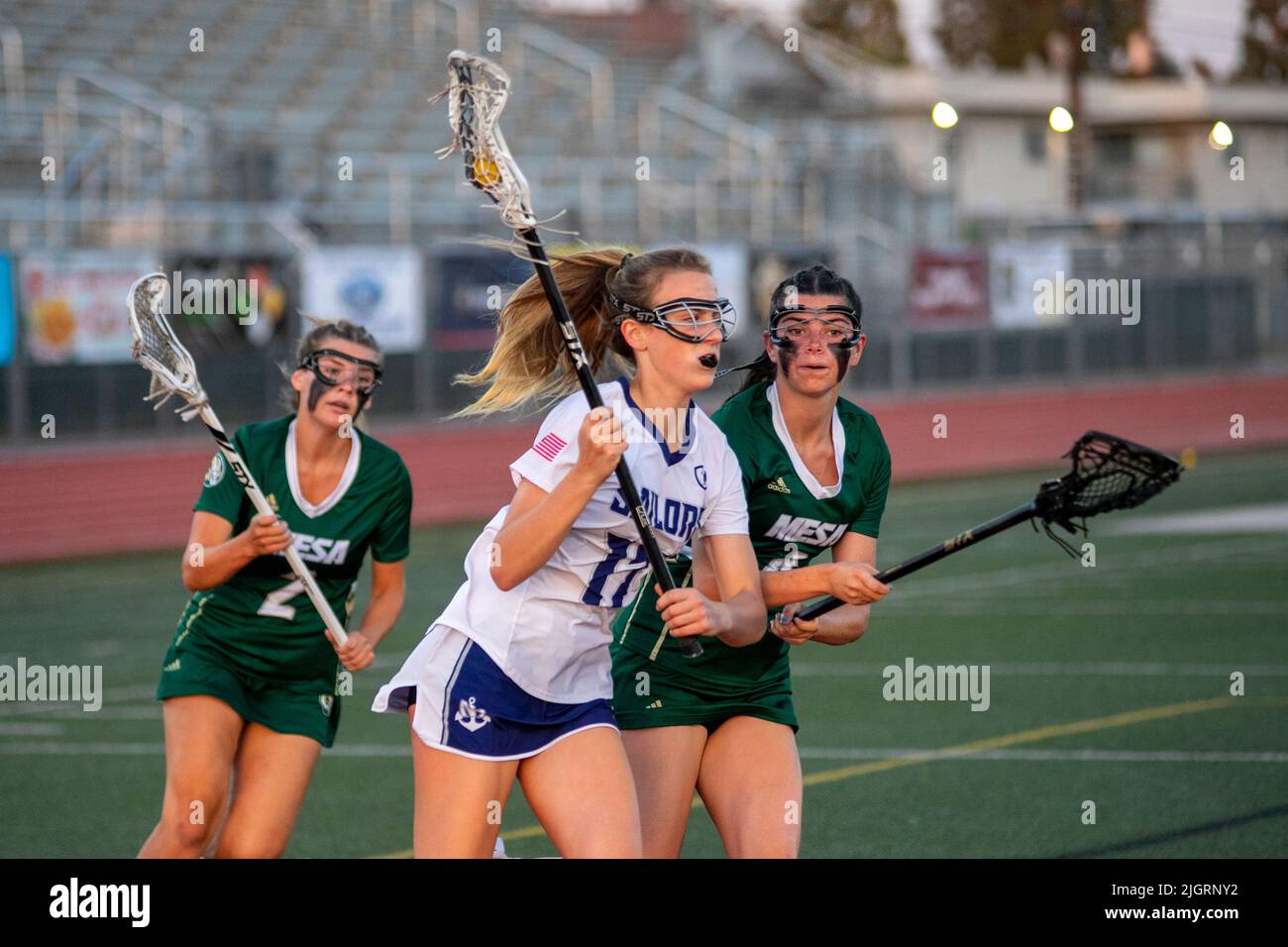 High school girls play a spirited lacrosse game in a Downey, CA ...