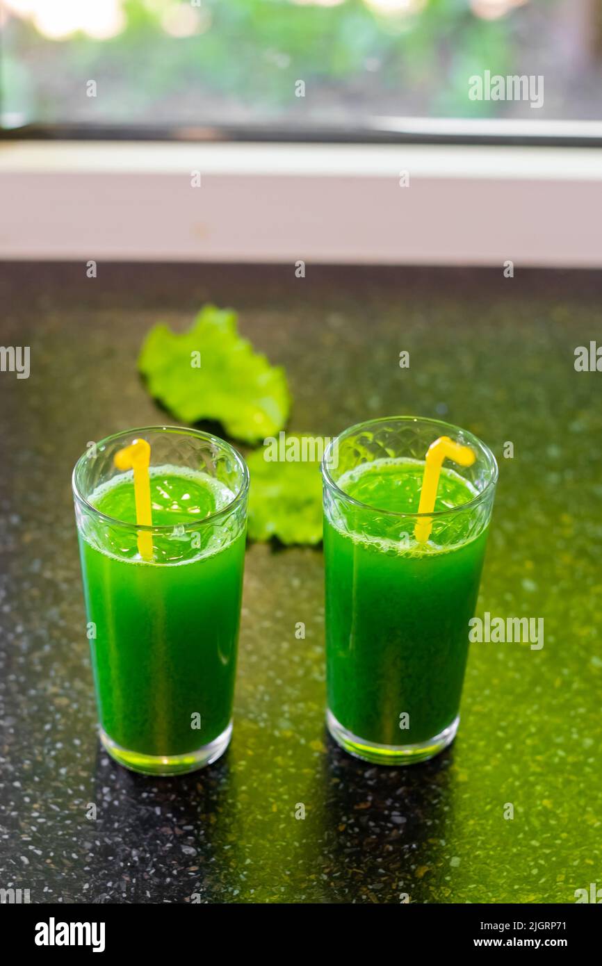 A green drink made from fresh vegetable greens with chlorophyll in ...