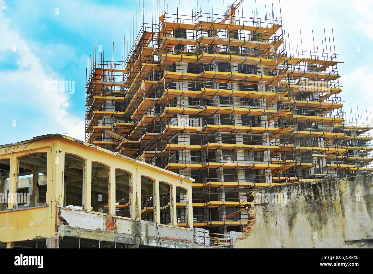 A construction site with huge scaffolding around the buildings Stock ...