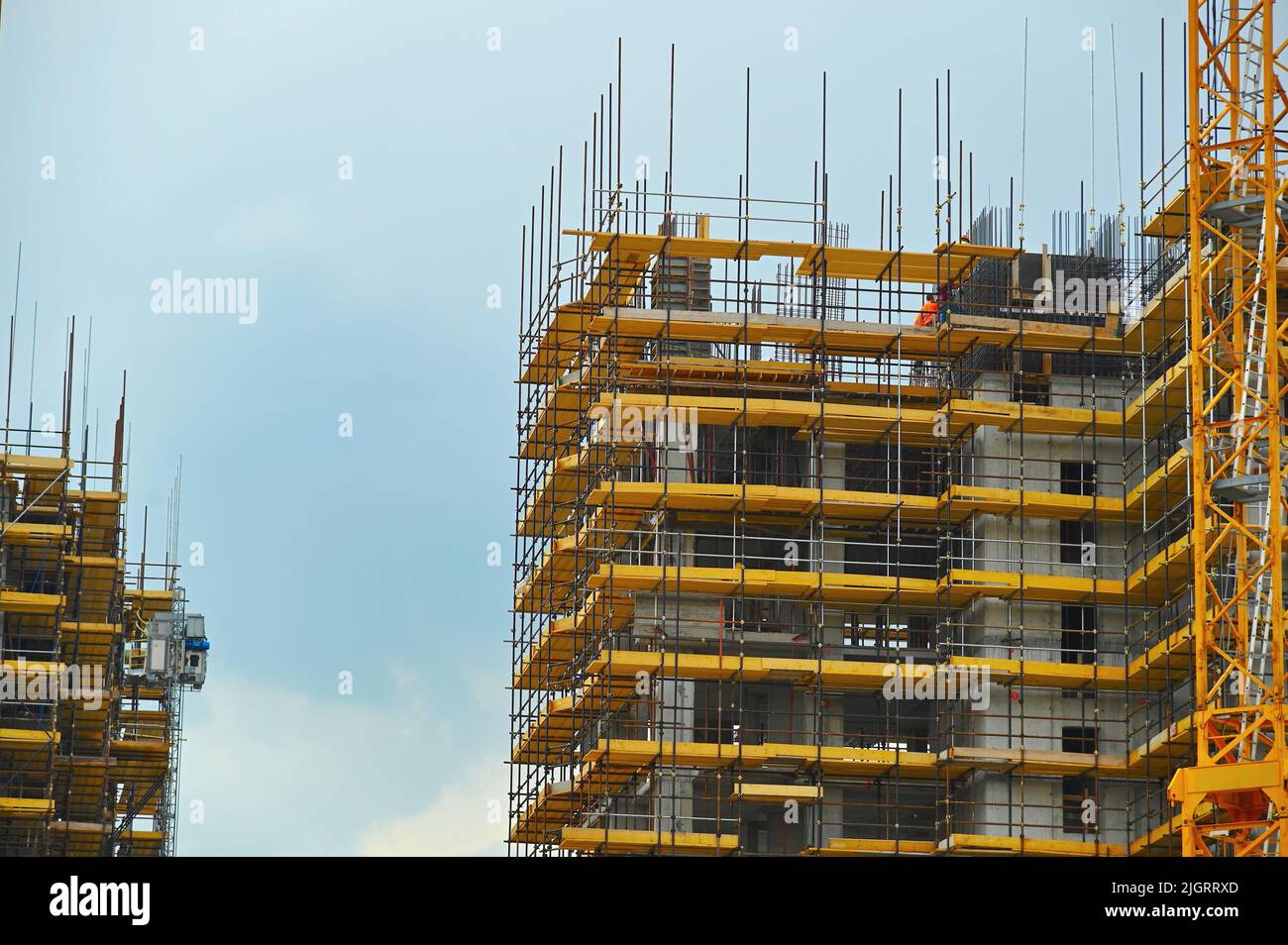 A construction site with huge scaffolding around the buildings Stock ...