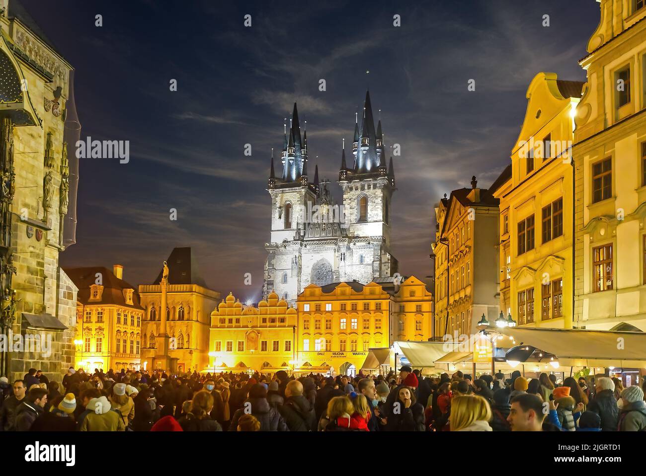 The Old city square in Prague, Czech republic in the night with a crowd ...