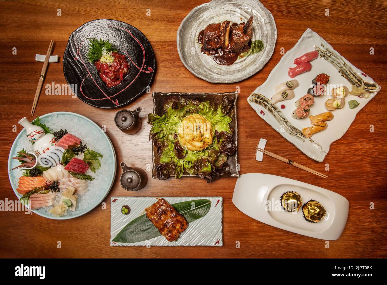 Asian food plates with delicious sashimi sushi with lots of ice, salmon ...