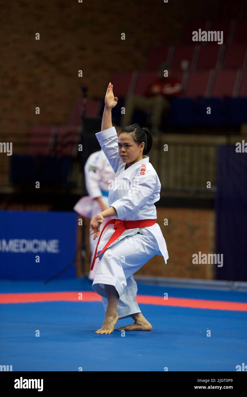 Alexandra Camacho Anacan from New Zealand stands with one arm up during ...