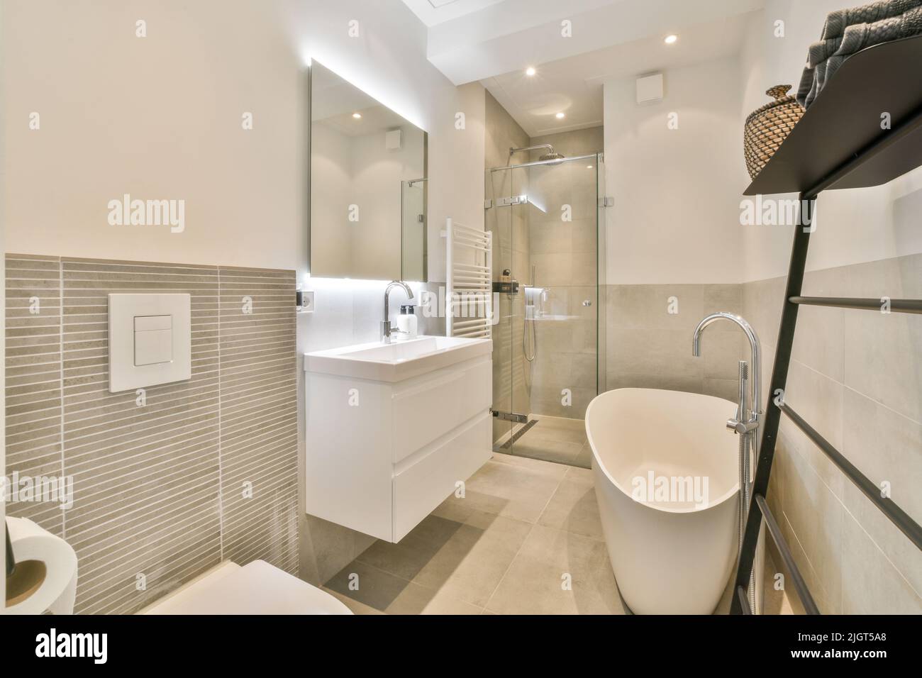 Modern home interior design of white bathroom with open bathtub and ...