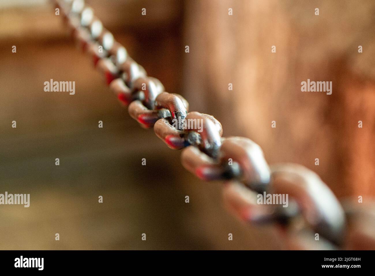 Old metal chain on water background in the sunlight Stock Photo - Alamy