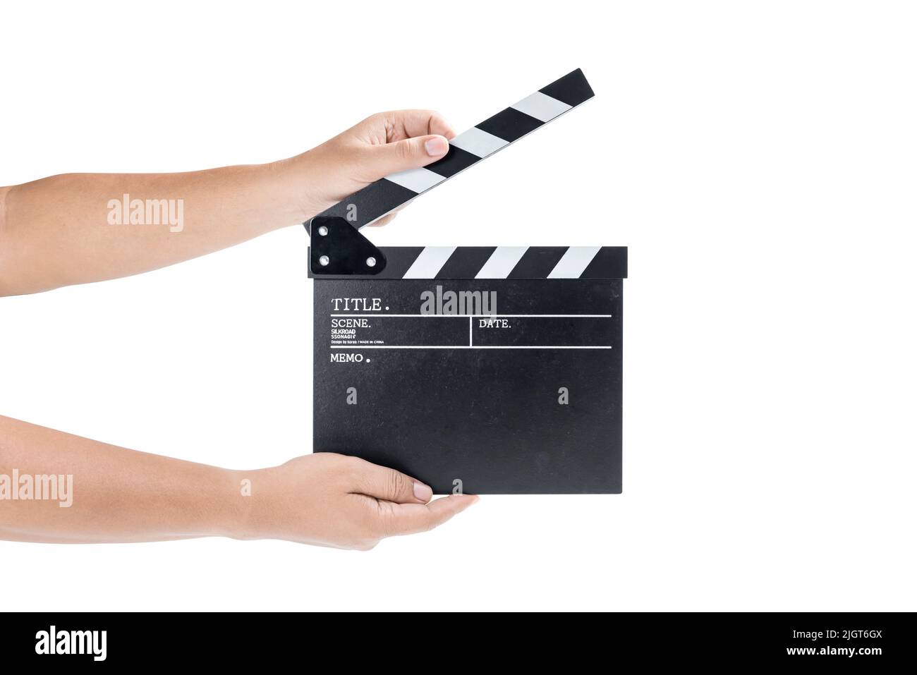Human hand holding black clapper board isolated over white background ...