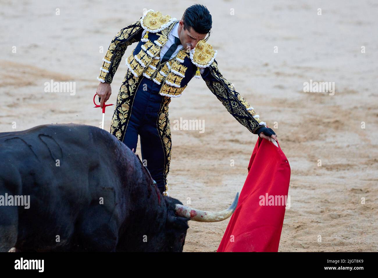 Alejandro Talavante fighting the fifth bull of the afternoon at the San ...