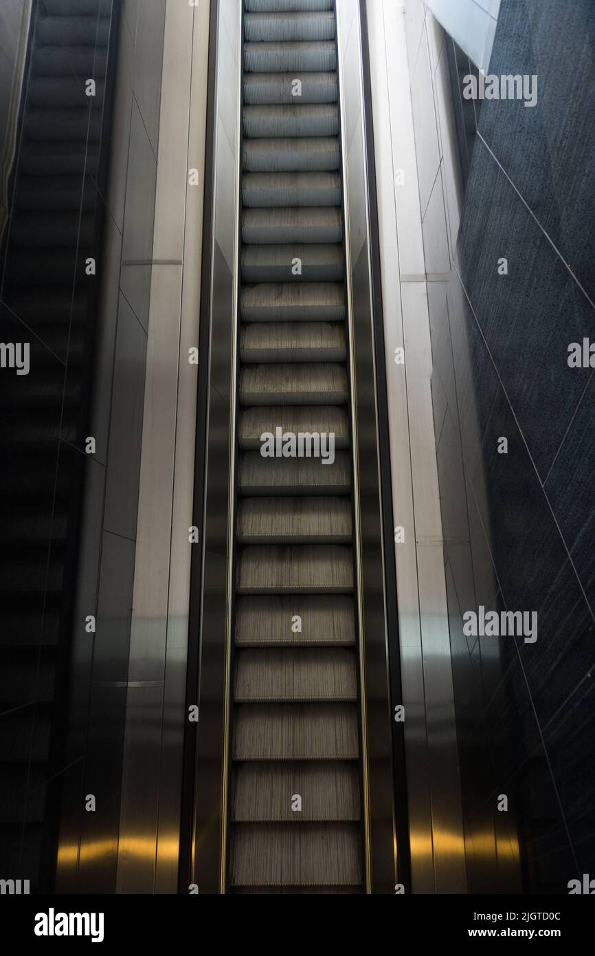 Top view long futuristic long escalator moving staircase stairs ...
