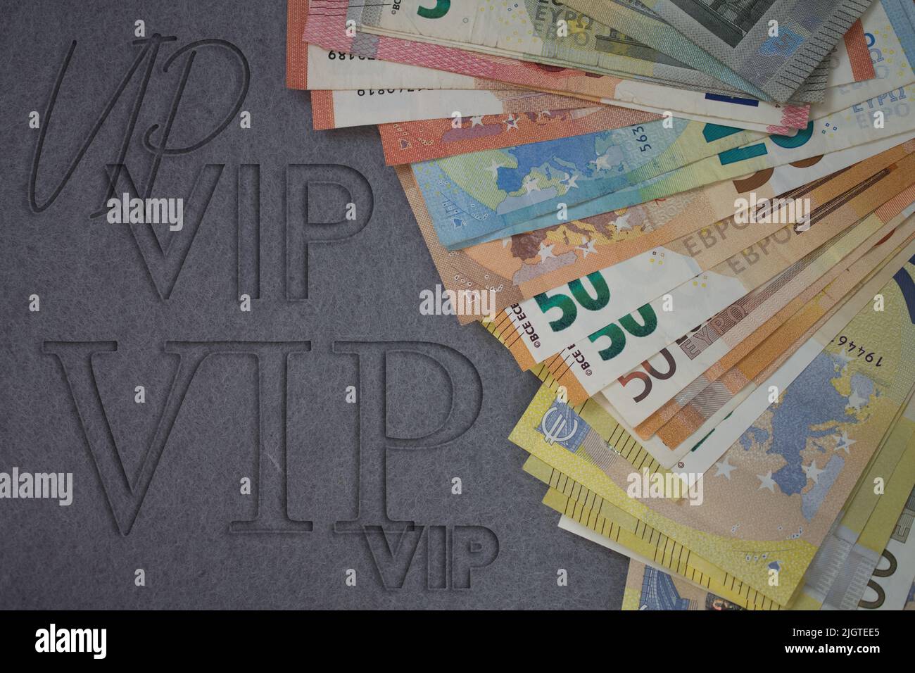 VIP word with money. Paper currency background with different banknotes ...
