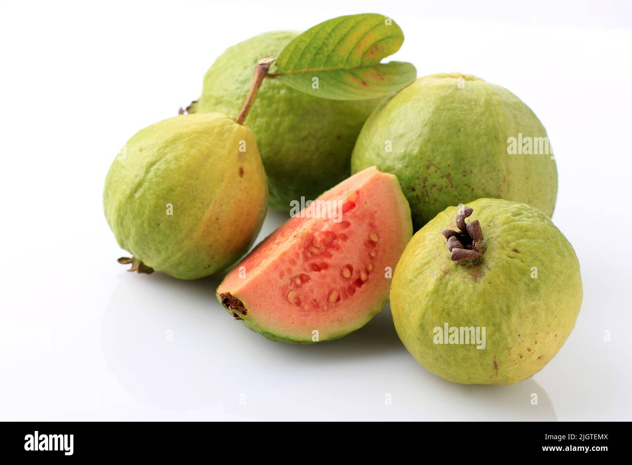 Guava Fruit, Pink, Fresh, Organic, with Leaves, Whole and Sliced ...