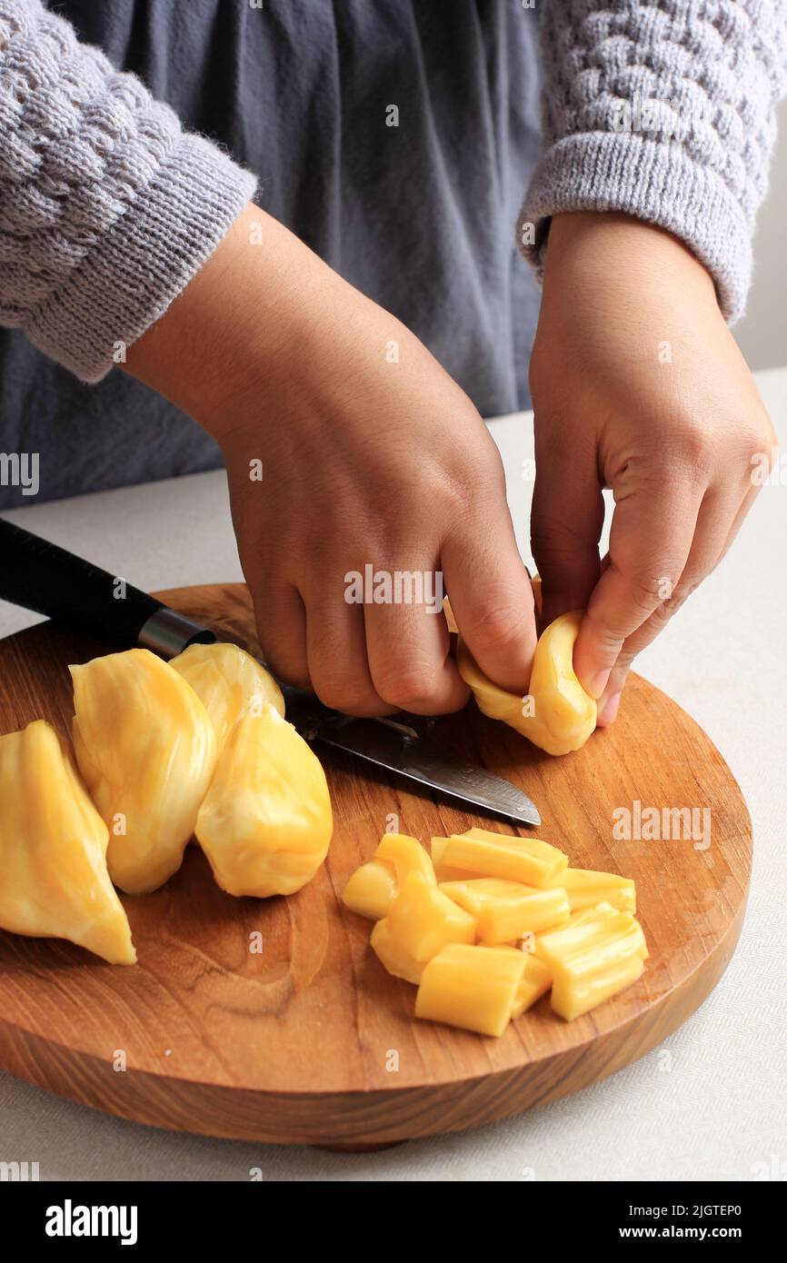 Female Hand Process Take Jackfruit Seeds, Step By Step Making Dessert ...