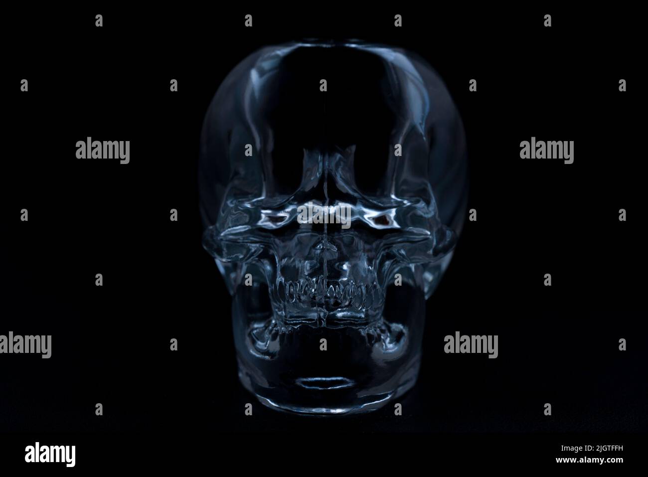 Crystal skull ancient artifact on black background. Front portrait ...