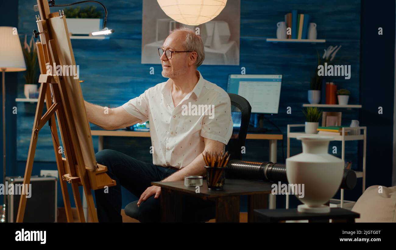 Male artist using creativity tools and design inspiration to draw ...